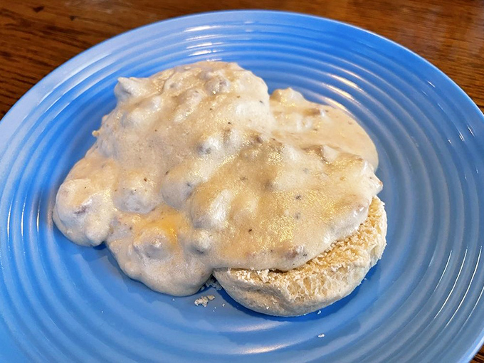 Behold the star attraction: a cloud-like biscuit swimming in peppery sausage gravy that makes you question why you'd ever eat anything else for breakfast.