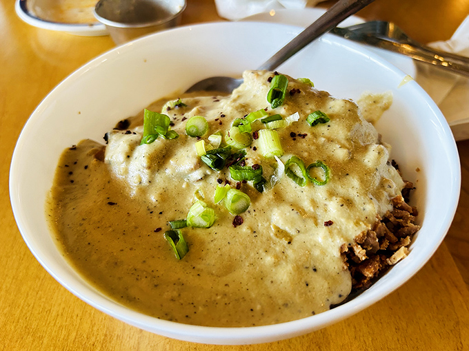 The legendary biscuits and gravy &ndash; a creamy, peppery masterpiece that could convert even the most dedicated carnivore.