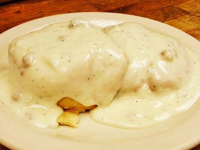 Behold the star attraction: biscuits drowning in creamy, peppery gravy studded with sausage. This isn't a meal&mdash;it's an edible hug on a plate.