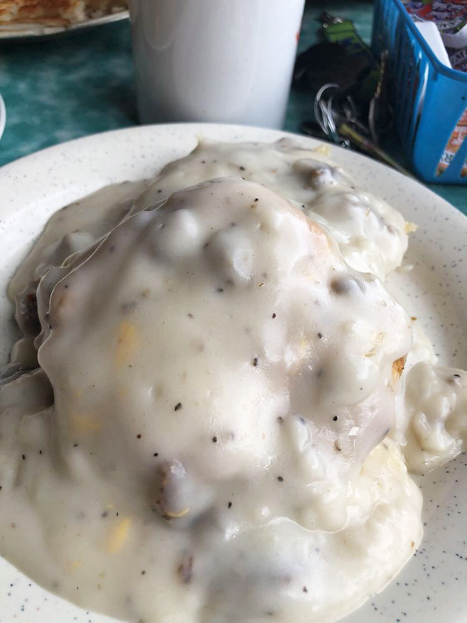 Behold the star attraction: biscuits drowning in a sea of peppery, sausage-studded gravy that's converted more locals than a revival tent.