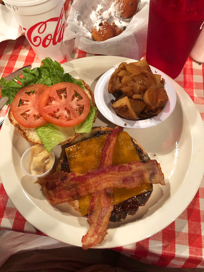 This isn't just a burger&mdash;it's architecture. The bacon crosshatch pattern is what engineers would design if they were really, really hungry.