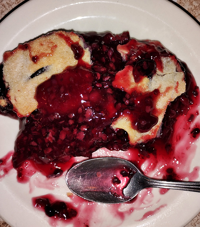 This blackberry cobbler isn't just dessert; it's summer in Indiana captured in a bowl. The perfect marriage of warm pastry and juicy berries.