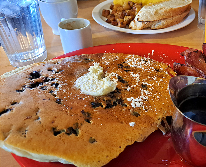These blueberry pancakes aren't just breakfast&mdash;they're an edible postcard from Vermont, complete with a butter pat melting into morning bliss.