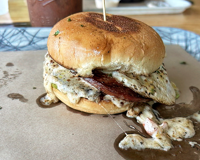 The star of the show: a bologna sandwich that's had a glow-up worthy of a Hollywood makeover. Thick-cut, seared to perfection, and oozing with melty cheese.