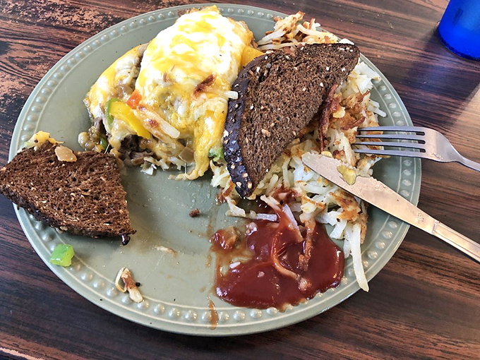 This isn't just breakfast—it's edible architecture with perfectly crisp hash browns as the foundation for cheesy, eggy bliss.