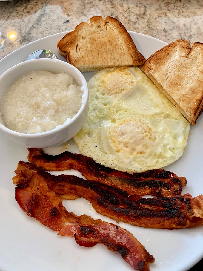 Breakfast perfection doesn't need fancy plating&mdash;just perfectly cooked eggs, crispy bacon, and grits that would make any Southern grandmother nod in approval. 