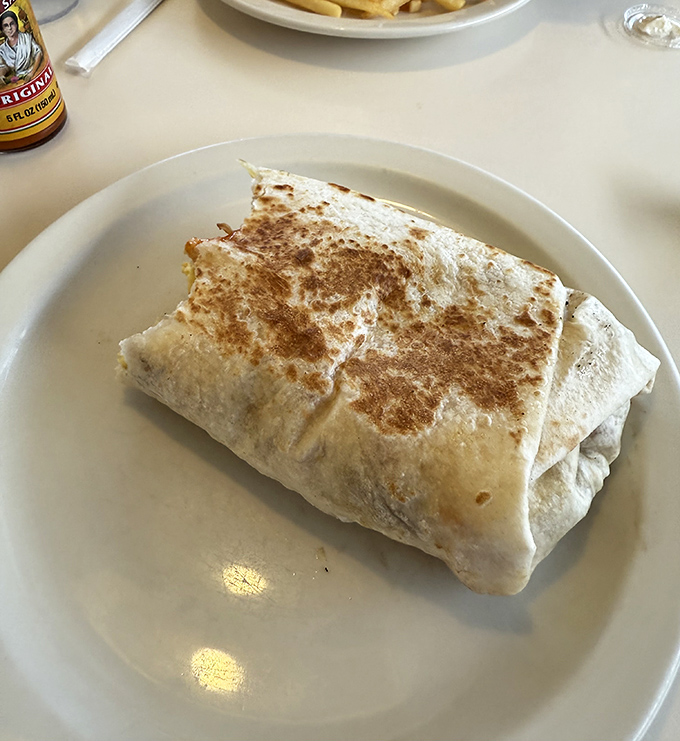 Behold the legendary breakfast burrito&mdash;grilled to golden perfection, stuffed with morning magic, and worth every mile of your pilgrimage.
