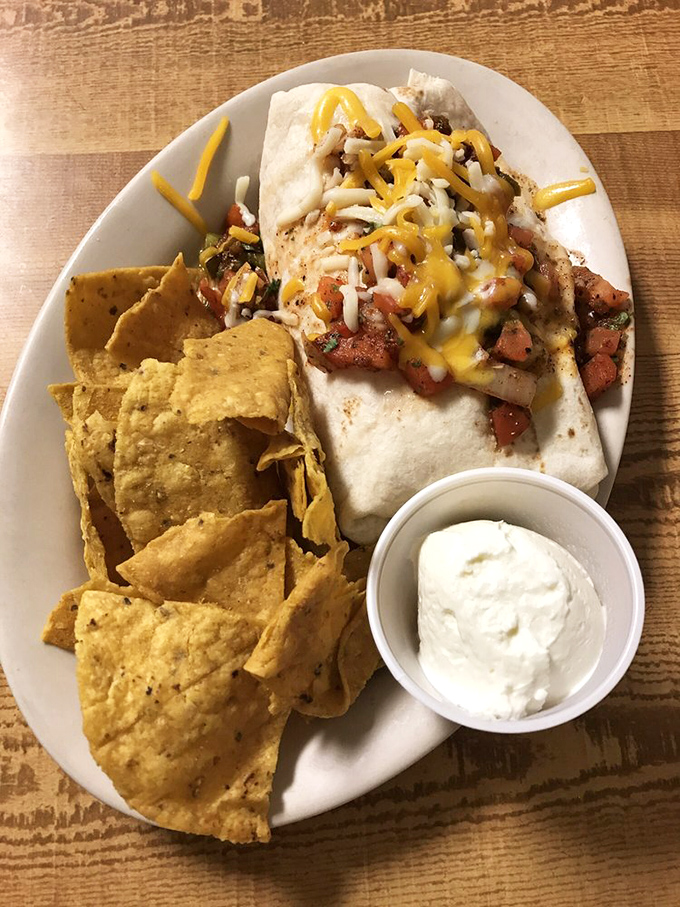 The Breakfast Burrito arrives like a gift from the morning gods&mdash;tortilla-wrapped treasures with local chips standing guard.
