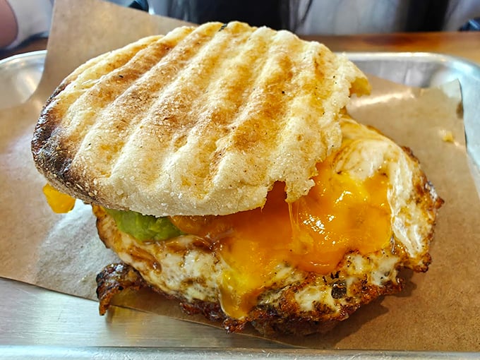 Behold the breakfast sandwich in its natural habitat&mdash;perfectly grilled bread, melty cheese, and that egg yolk just waiting for its Instagram moment.
