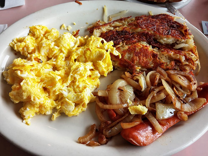 Sunshine on a plate! These scrambled eggs achieve that perfect fluff factor while the hash browns deliver the golden crispiness we all dream about.