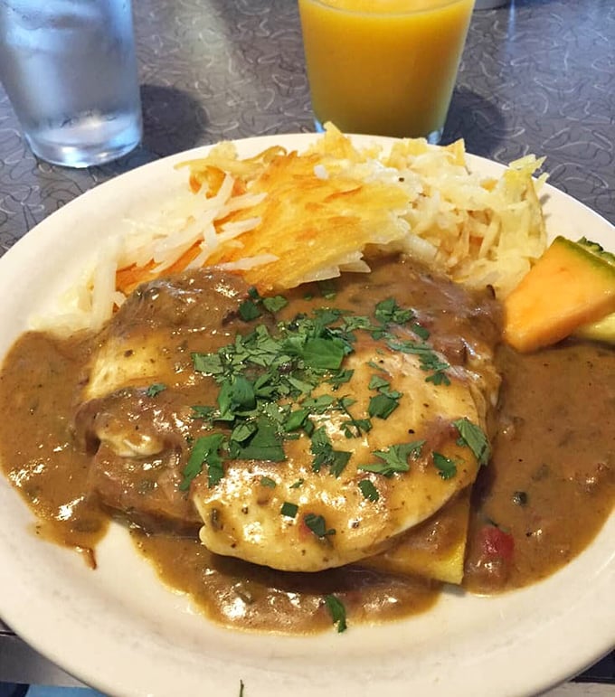 Gravity-defying hash browns meet savory gravy in this plate that doesn't just satisfy hunger&mdash;it creates food memories that last for years.