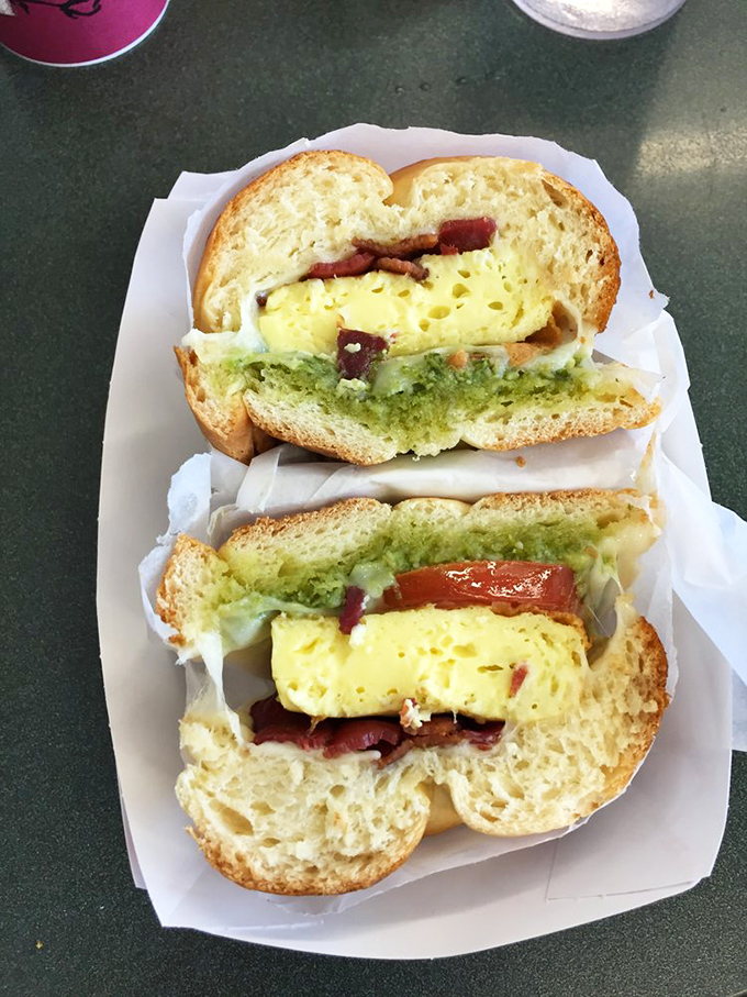 The legendary breakfast sandwich in all its glory&mdash;perfectly cooked eggs, vibrant pesto, and bread that deserves its own fan club.