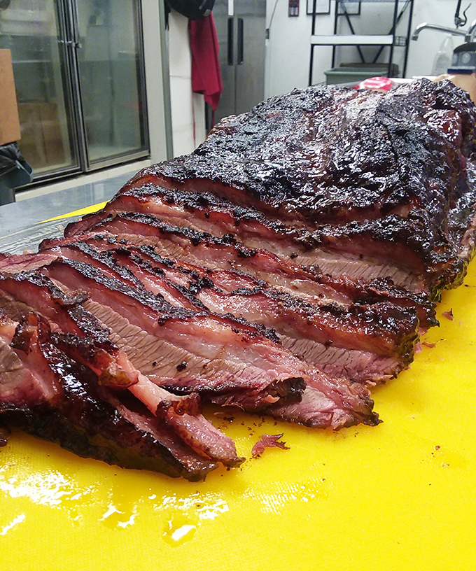 Brisket so perfectly rendered it practically poses for its close-up. That bark and smoke ring aren't just pretty&mdash;they're edible evidence of patience.