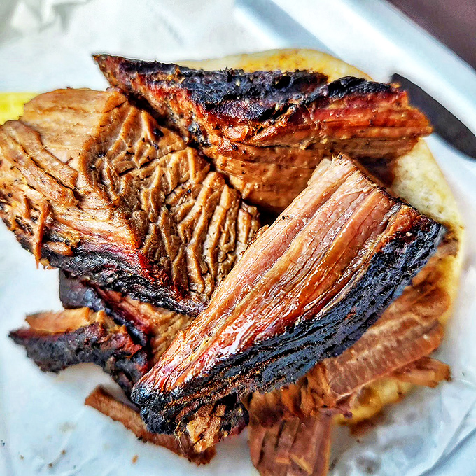Brisket that doesn't just fall apart&mdash;it surrenders completely, waving the white flag of fat-rendered perfection after hours in the smoker.