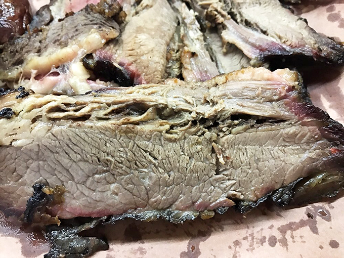 Brisket that doesn't just melt in your mouth&mdash;it throws a party there. The perfect smoke ring is nature's way of saying "you're welcome."