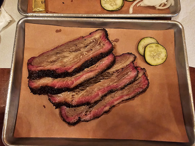 Behold the brisket in all its glory&mdash;perfectly pink smoke ring, peppery bark, and juicy interior that would make a Texan tip their hat in respect.