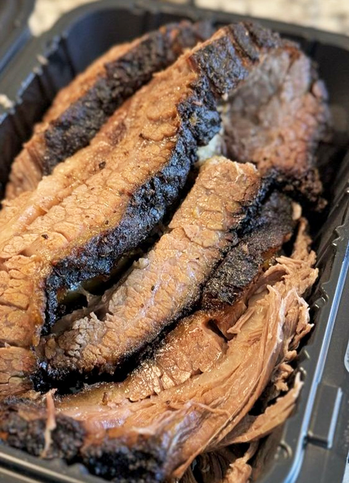 Behold the brisket in all its glory&mdash;that bark, that smoke ring! This isn't just meat; it's a 14-hour labor of love.