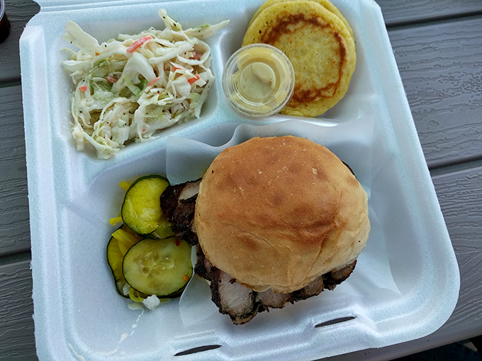 This isn't just a sandwich&mdash;it's architecture. Perfectly stacked brisket with pickles, slaw, and a bun that knows its supporting role.