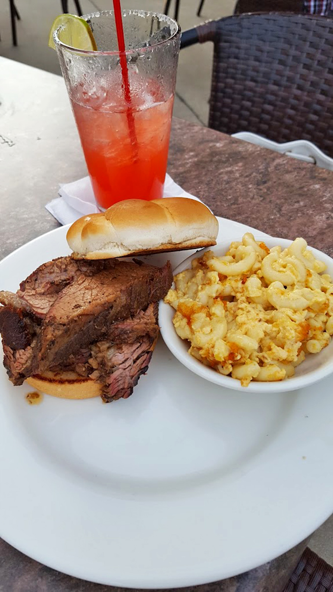 Brisket sandwich perfection doesn't need fancy plating&mdash;just meat with that telltale smoke ring, a simple bun, and mac and cheese that's calling your name.