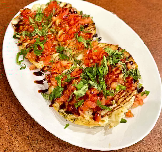 This bruschetta isn't just an appetizer&mdash;it's a masterpiece of perfectly toasted bread, vibrant tomatoes, and fresh basil that would make an Italian grandmother weep with joy.