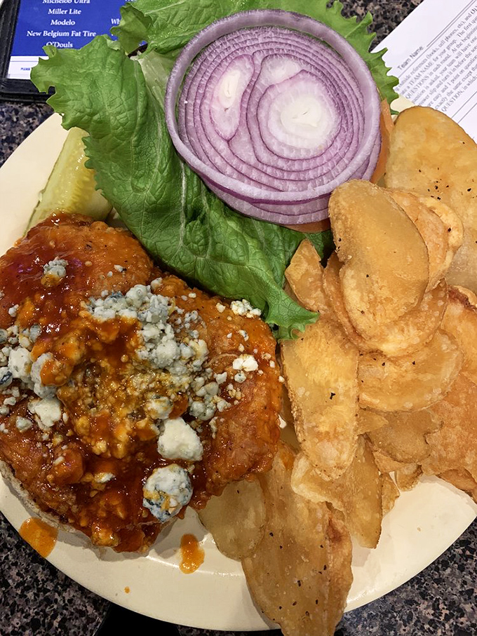 The legendary buffalo chicken sandwich in all its glory! That blue cheese crumble crown atop buffalo-sauced perfection might just change your sandwich standards forever. 