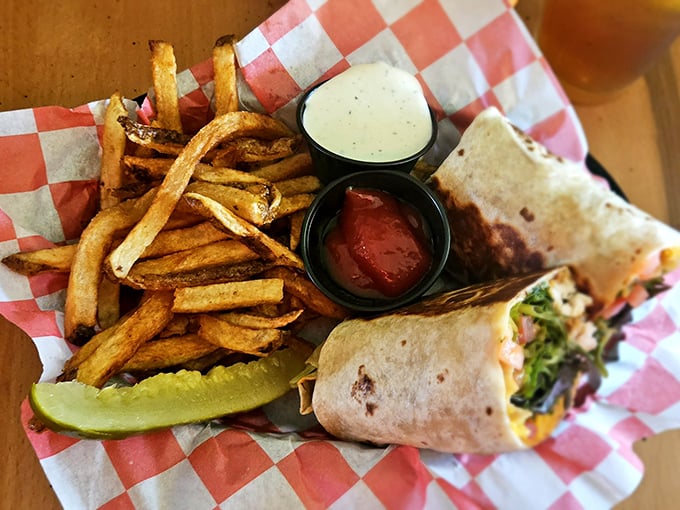 The legendary buffalo chicken wrap arrives like a flavor bomb wrapped in a tortilla, with crispy fries that deserve their own fan club