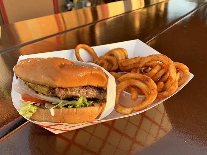 This isn't just a burger; it's edible poetry. The kind of handheld masterpiece that makes you forget about your phone for 10 blissful minutes.