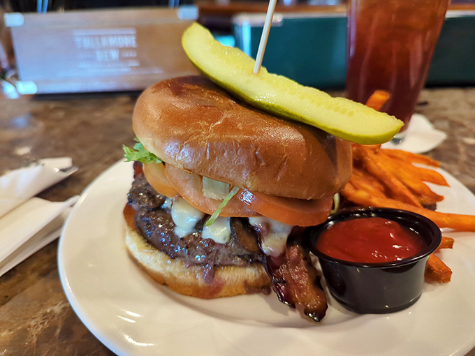 This isn't just a burger&mdash;it's a towering masterpiece of beef, melty cheese, and fresh toppings that demands both hands and several napkins.