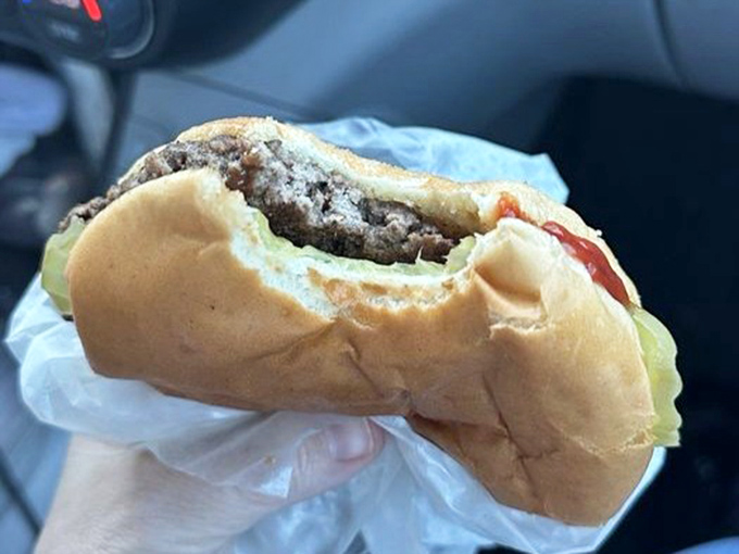 The humble hamburger in its natural habitat&mdash;wrapped in paper, not ego. One bite and you'll understand why people drive for hours.