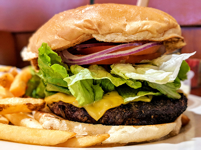 Behold the burger in all its glory&mdash;architectural perfection where each layer knows its role and plays it with Oscar-worthy conviction.