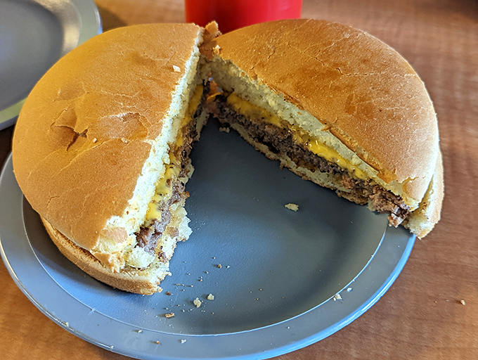 This burger doesn't need height to impress—its perfectly melted cheese and juicy patty make skyscrapers of other burgers seem like compensation.