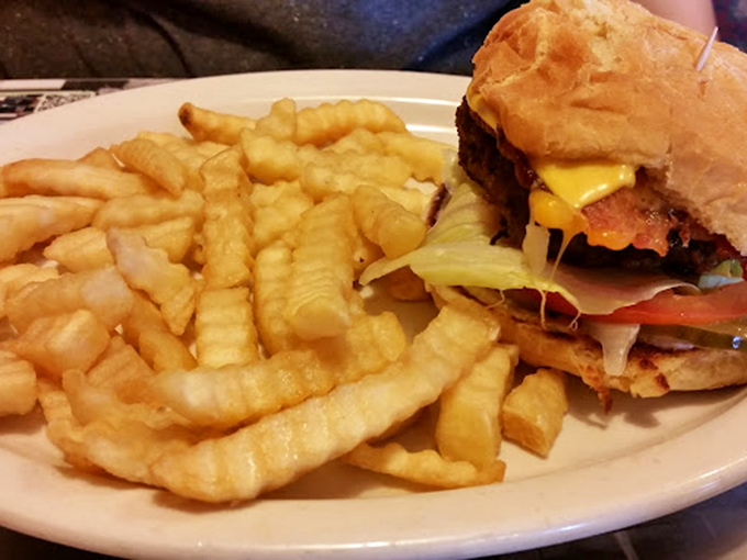 This double-decker beauty with waffle fries proves breakfast joints can absolutely nail lunch, and probably your New Year's resolutions too.