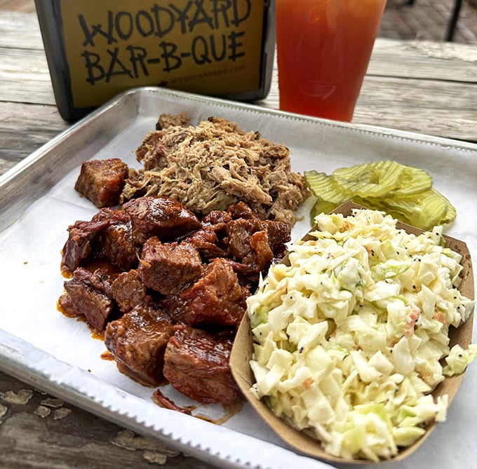 Barbecue's holy trinity: burnt ends, pulled pork, and coleslaw. This tray should come with a warning label: "May cause involuntary food noises."