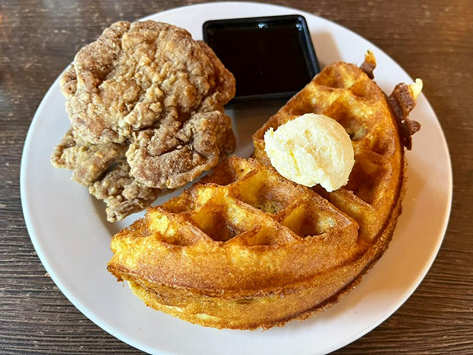 Their legendary chicken and waffles arrive like edible architecture&mdash;crispy meets fluffy in a sweet-savory masterpiece worth the drive.