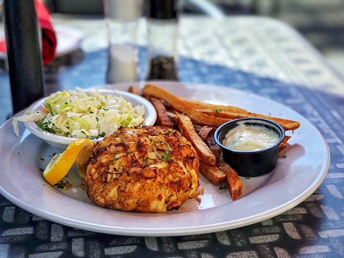 Golden-crusted crab cake perfection that would make Marylanders weep with joy. No filler, all killer. 