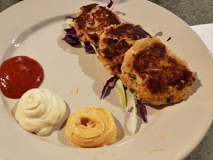 These crab cakes aren't just golden-brown – they're practically wearing halos. Three perfect discs of crabby heaven await.