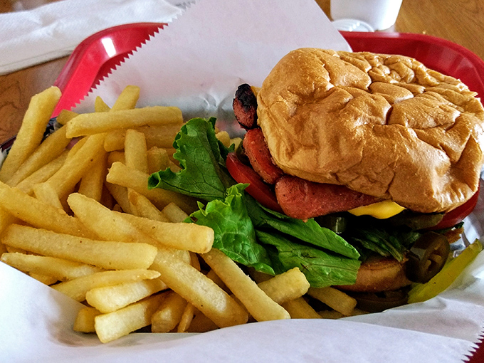 Behold the California Burger in its natural habitat&mdash;a red basket lined with paper, accompanied by fries that demand equal attention.