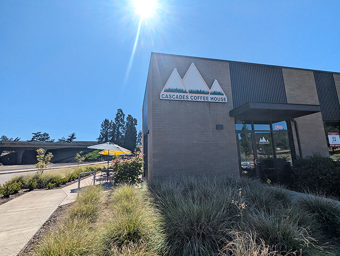 Cascades Coffee House brings mountain vibes to your morning routine. The outdoor seating practically begs you to linger over that second cup.