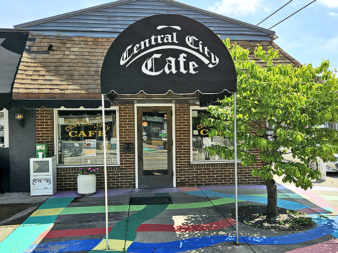 Central City Cafe's colorful entrance promises comfort food that doesn't need fancy explanations. That painted concrete is the runway to a culinary time machine.