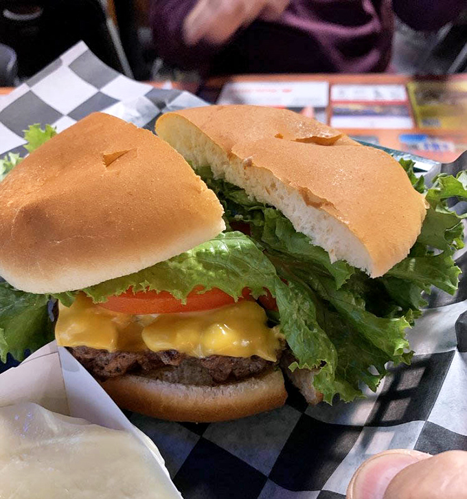 Behold the foundation of Ike's reputation: a perfectly grilled cheeseburger with lettuce so crisp it could audition for a salad commercial.