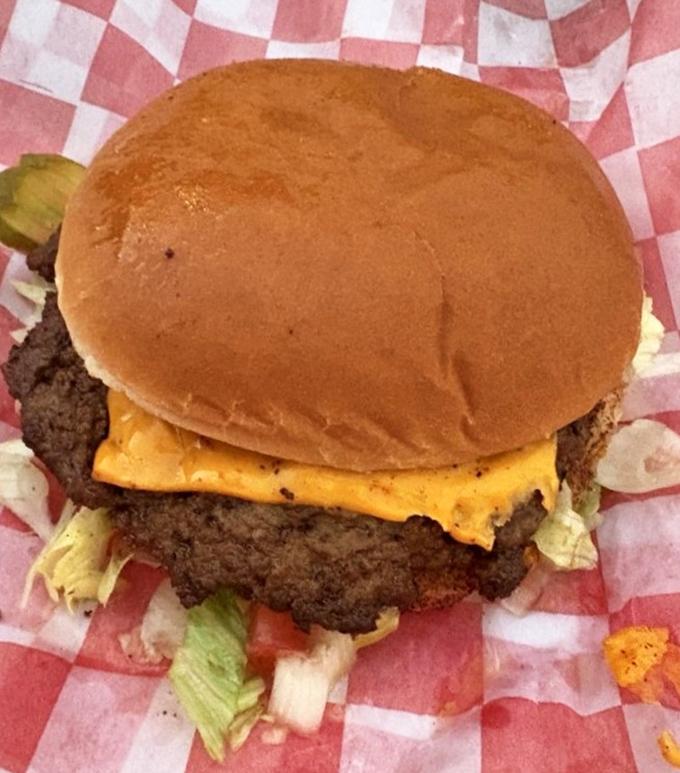 This isn't just a cheeseburger—it's a commitment, a relationship, a life-changing moment between two buns.