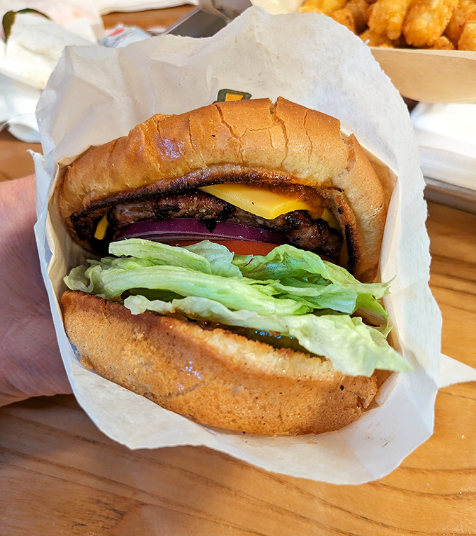 Not so much a burger as a hand-held celebration. Note the perfect char marks &ndash; the grill's autograph on a masterpiece.
