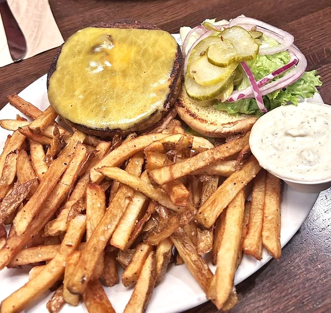 This isn't just a cheeseburger&mdash;it's a masterpiece of melty perfection with hand-cut fries that deserve their own fan club.