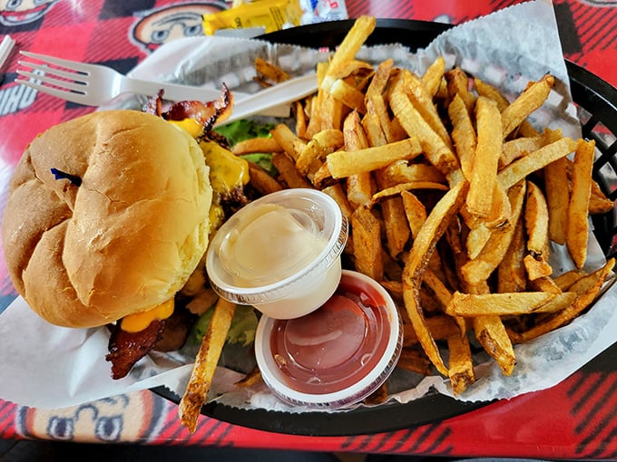Burger perfection doesn't need fancy frills. Golden fries, melty cheese, and a perfectly toasted bun make this a roadtrip-worthy destination.