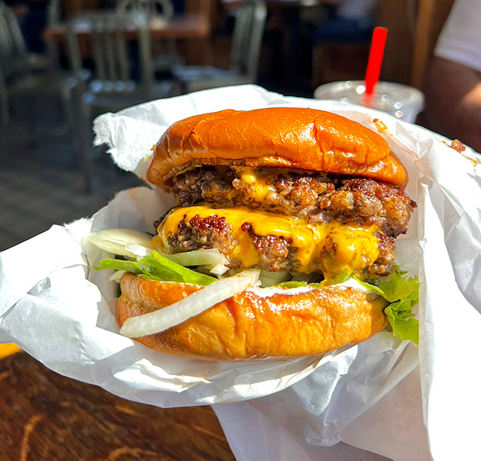 Behold the Double Cavern Burger in all its glory&mdash;where cheese cascades down hand-formed patties like a yellow lava flow of deliciousness.