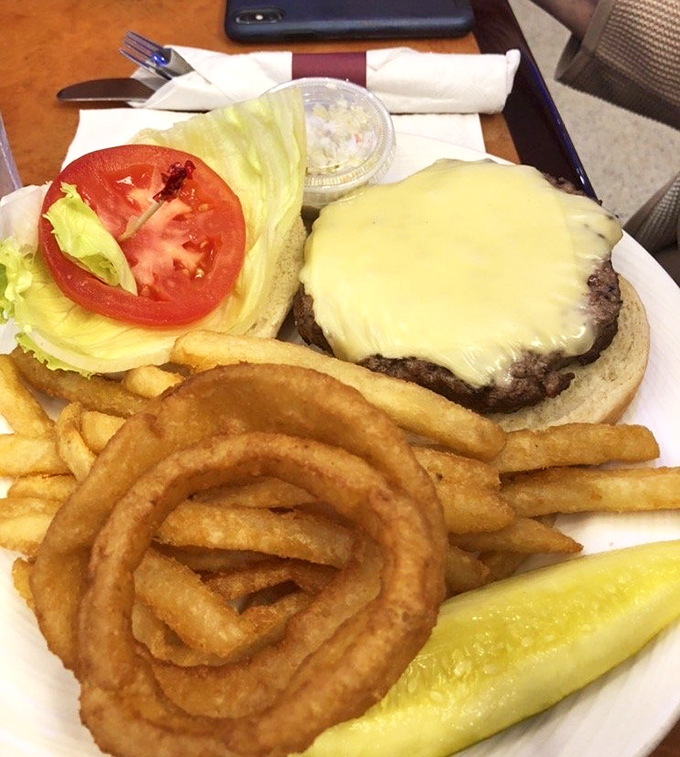 Not all cheeseburgers are created equal&mdash;this one arrives with an onion ring crown and a pickle scepter, ready to rule your lunch hour.