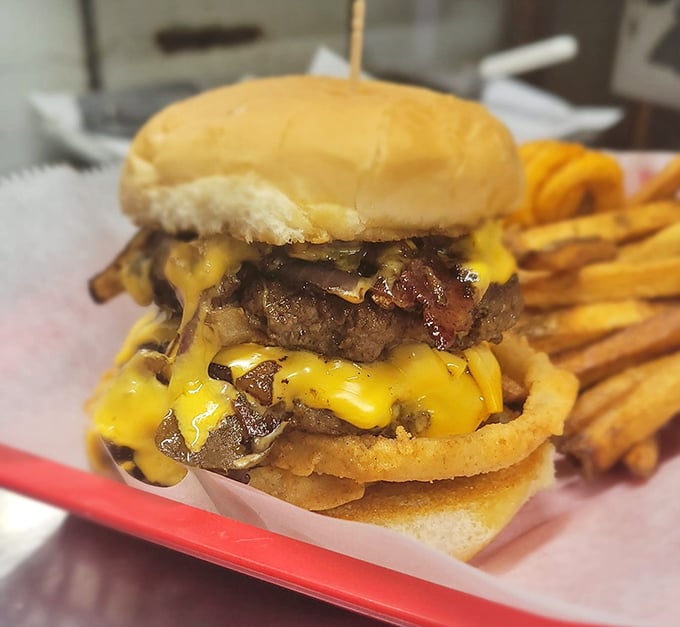 Behold the star of our show&mdash;a cheeseburger that doesn't need Instagram filters to stop traffic. That cheese cascade isn't just photogenic; it's a flavor waterfall worth crossing state lines for.
