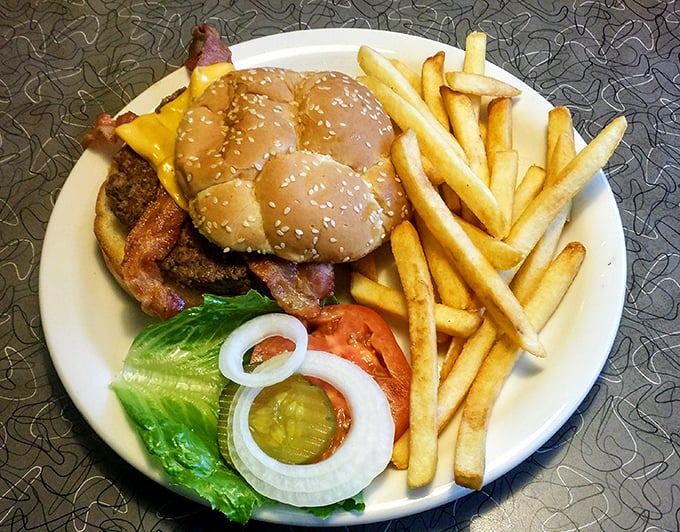 This isn't just a burger&mdash;it's architecture. The perfect stack of beef, cheese, and bacon that makes calorie-counting seem like buzzkill behavior.
