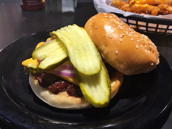 A classic burger with pickle spears standing guard like sentinels. Simple perfection that proves zombies have excellent taste in comfort food.