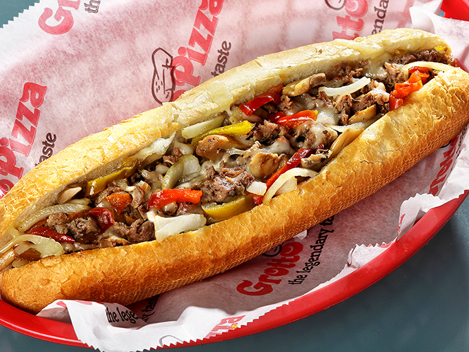 Behold the cheesesteak in all its glory! Tender ribbons of steak, melted cheese, and the perfect ratio of peppers and onions &ndash; it's Pennsylvania's answer to the French dip.